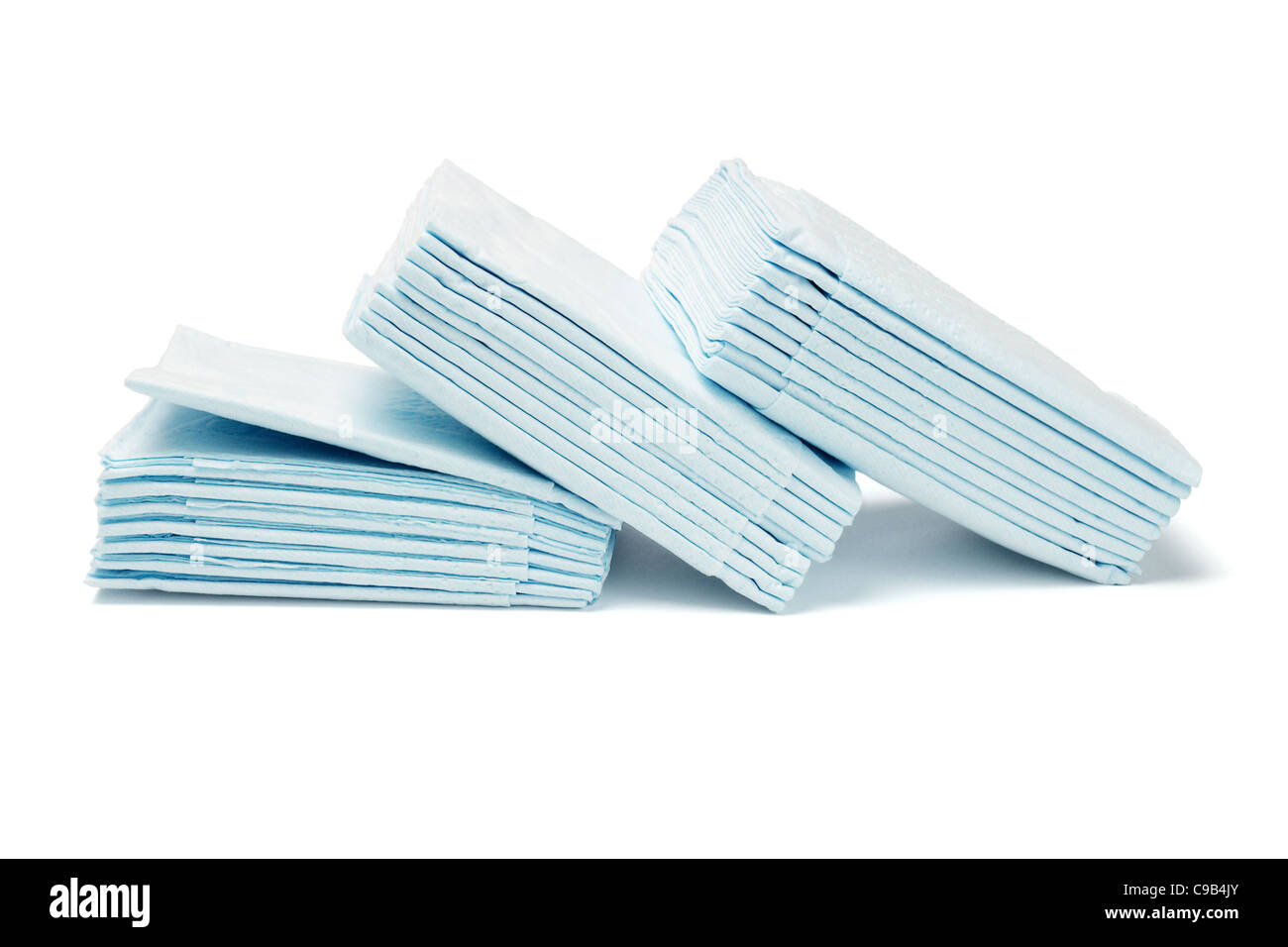 Stacks of blue folded facial tissue papers on white background Stock ...