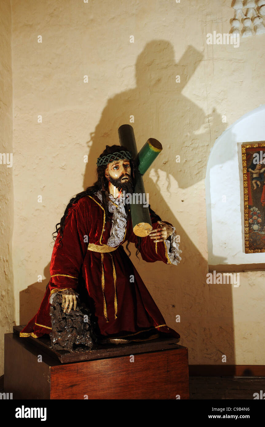 A statue of Jesus carrying a cross in Santa Catalina convent, Arequipa ...
