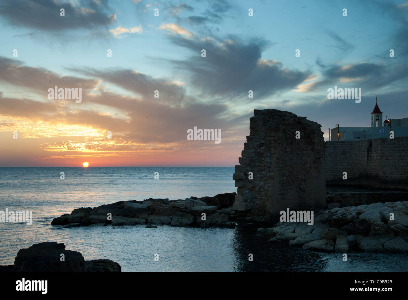 The sun sets over the Mediterranean Sea at Akko (Acre), Israel Stock ...
