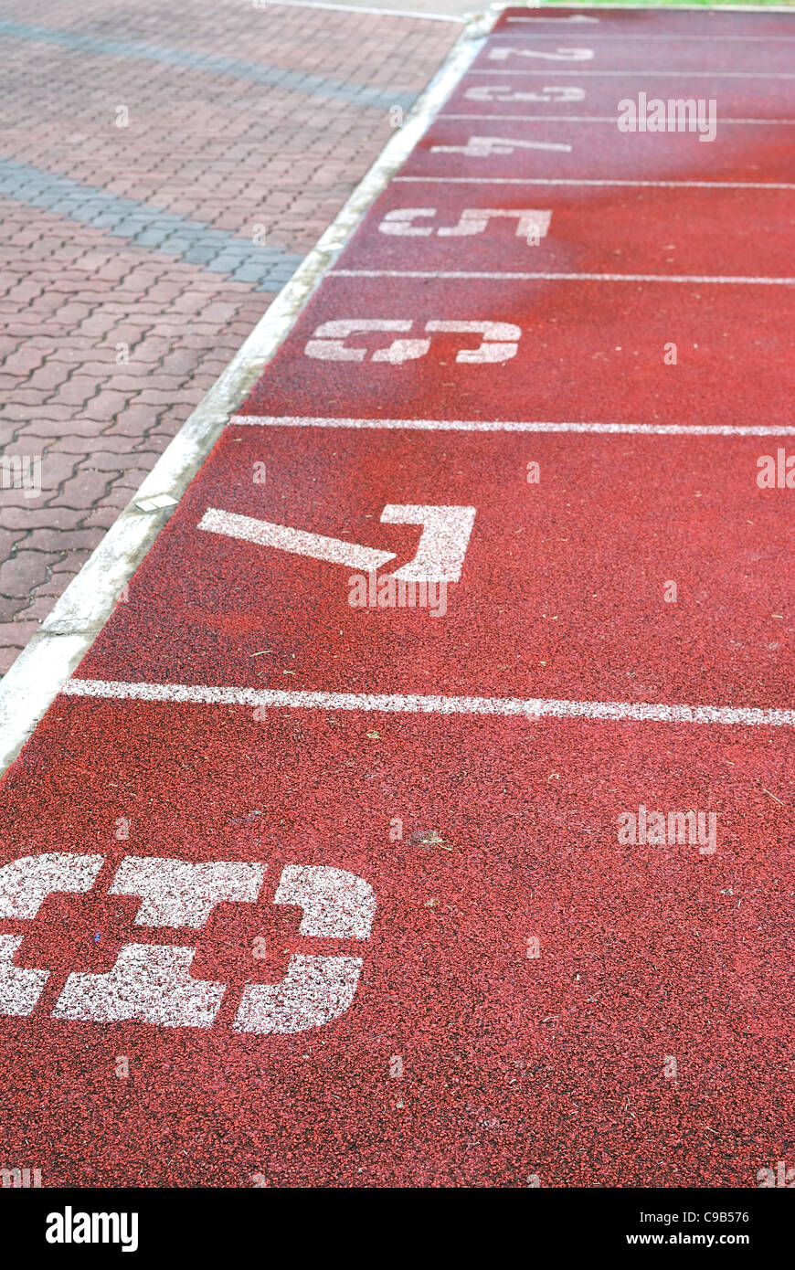 Numbered running track at the stadium. For sports and exercise, dieting ...