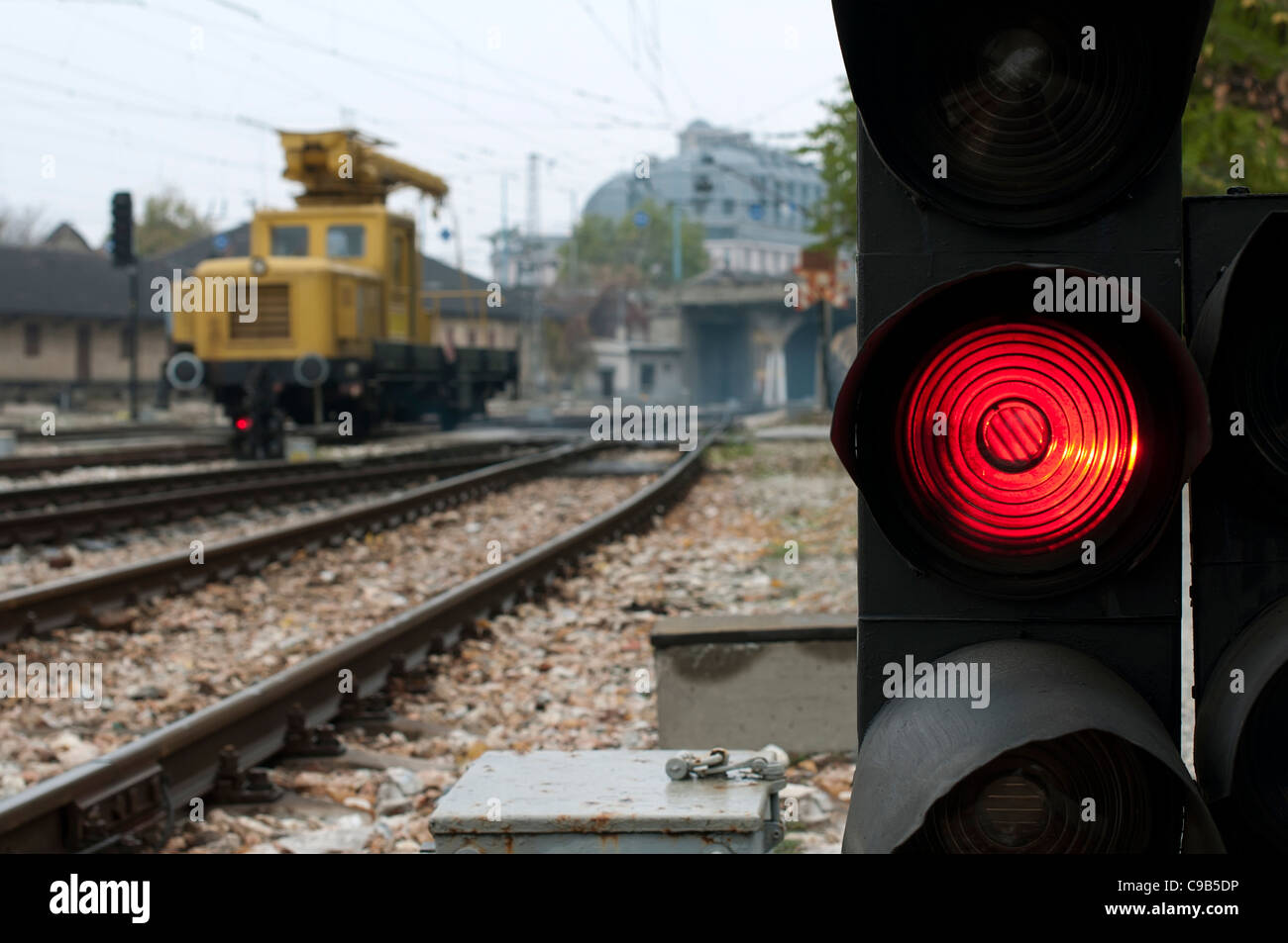 Traffic light shows red signal on railway. Red light Stock Photo - Alamy
