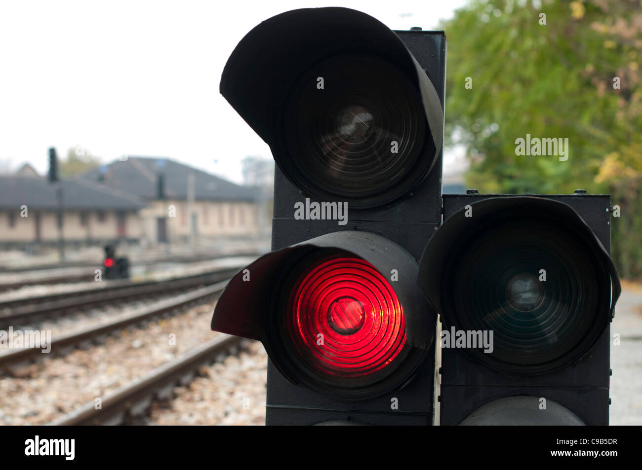 Traffic light shows red signal on railway. Red light Stock Photo - Alamy