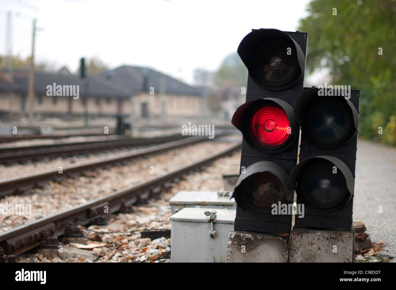 Traffic light shows red signal on railway. Red light Stock Photo - Alamy
