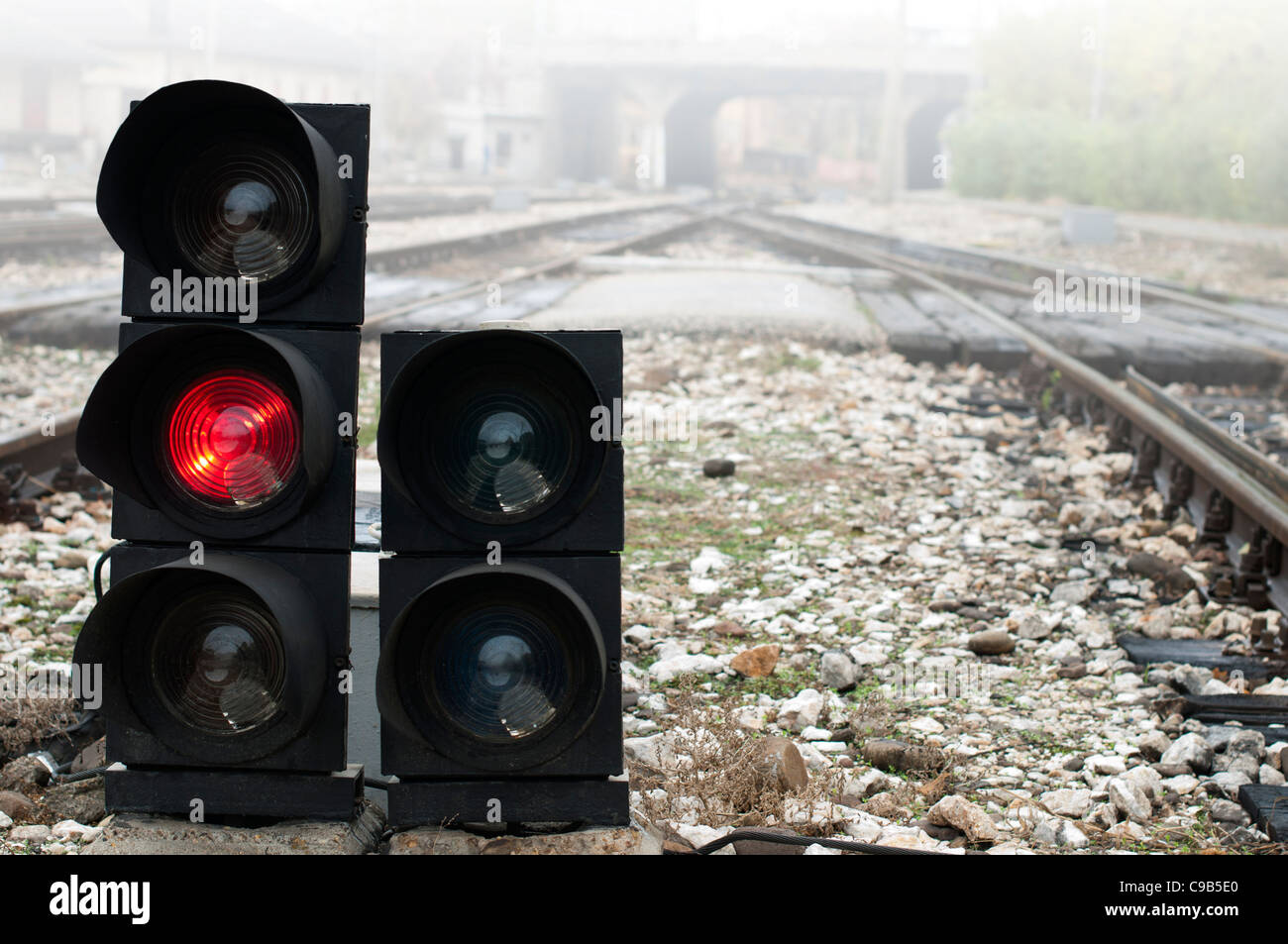 Traffic light shows red signal on railway. Red light Stock Photo - Alamy