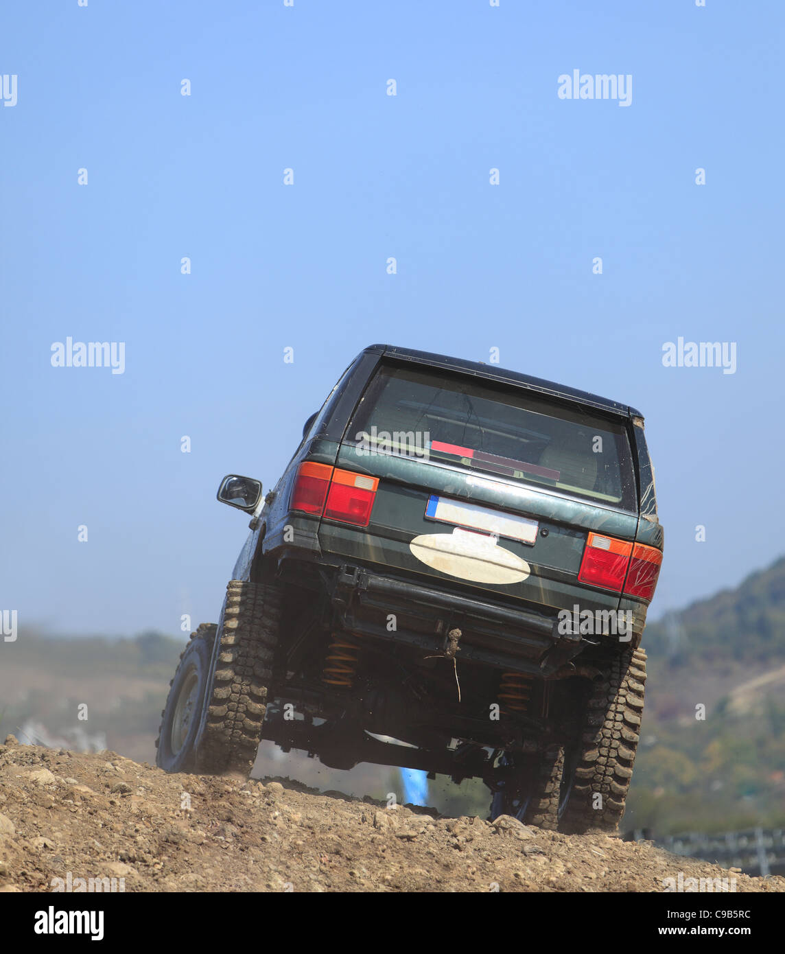 Truck driving on a very difficult off-road route Stock Photo - Alamy