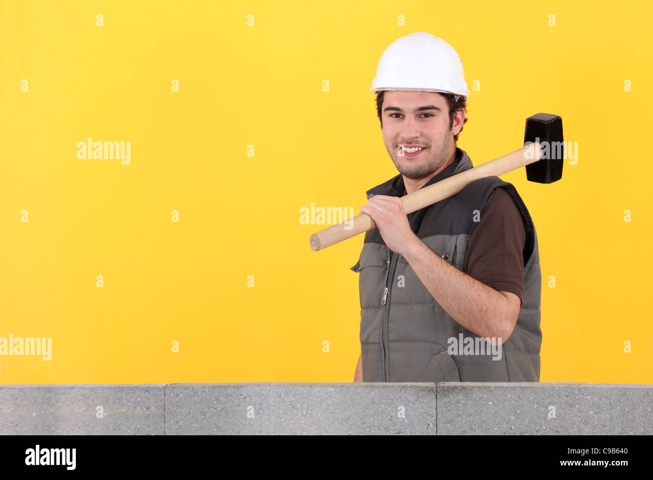 craftsman holding a hammer Stock Photo - Alamy