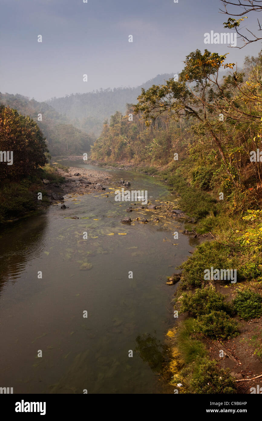 India, Nagaland, River Longkhum passing through wooded hills in early ...