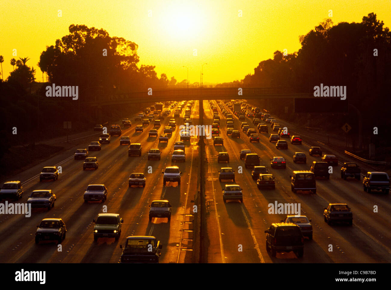 A Los Angeles freeway is crowded with cars and other vehicles as the ...