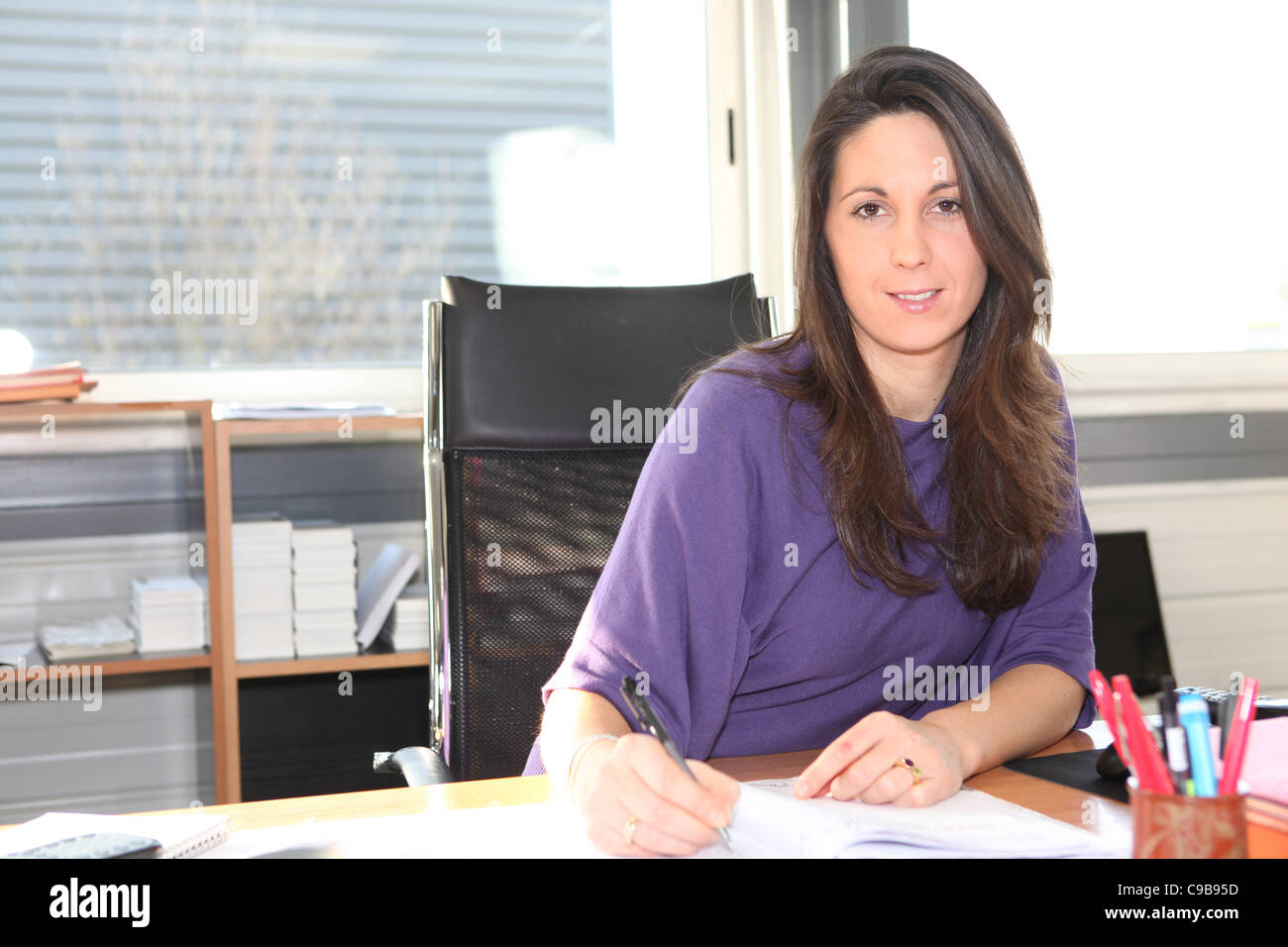 a female employee at work Stock Photo - Alamy