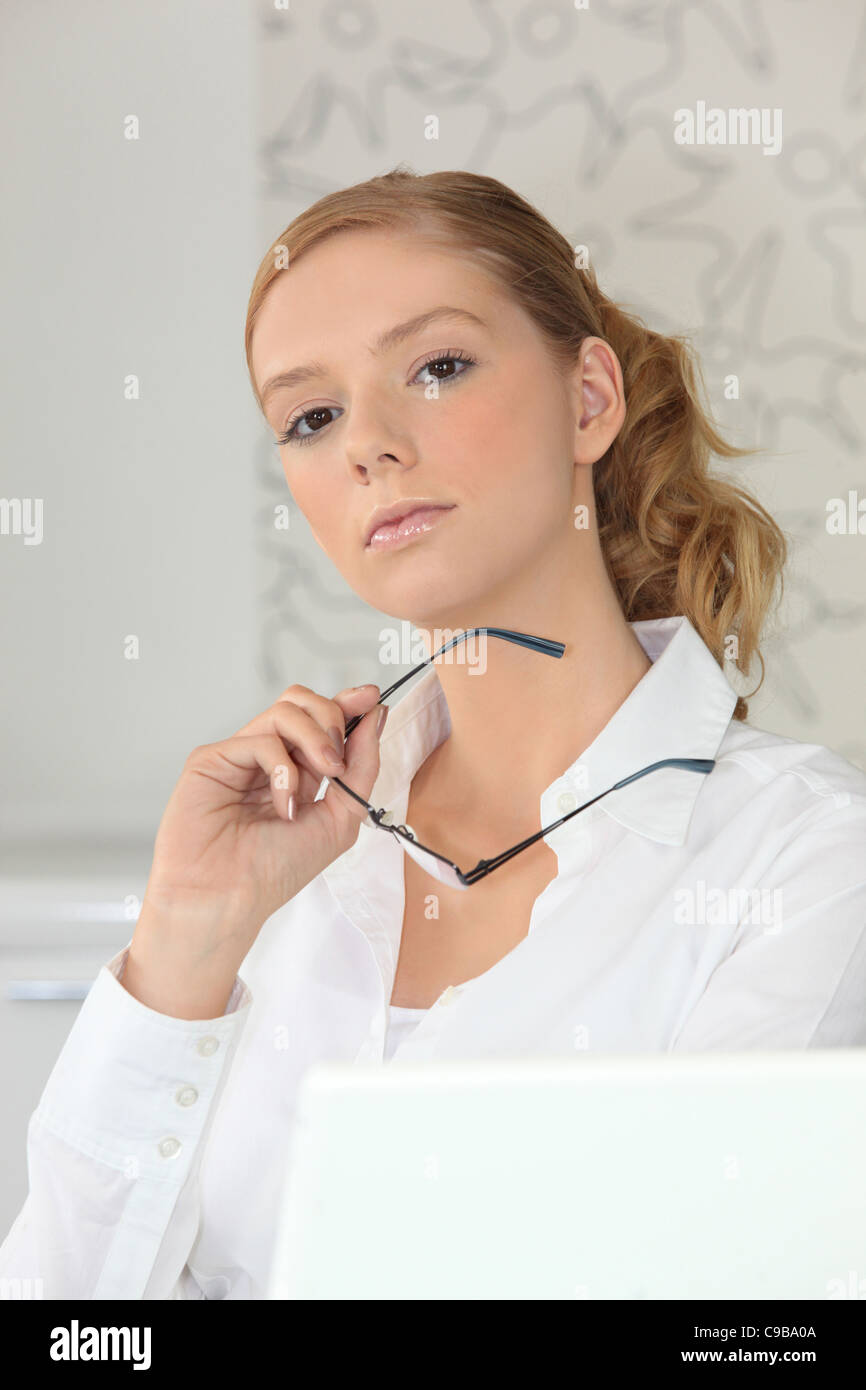 Young woman with haughty gaze Stock Photo - Alamy