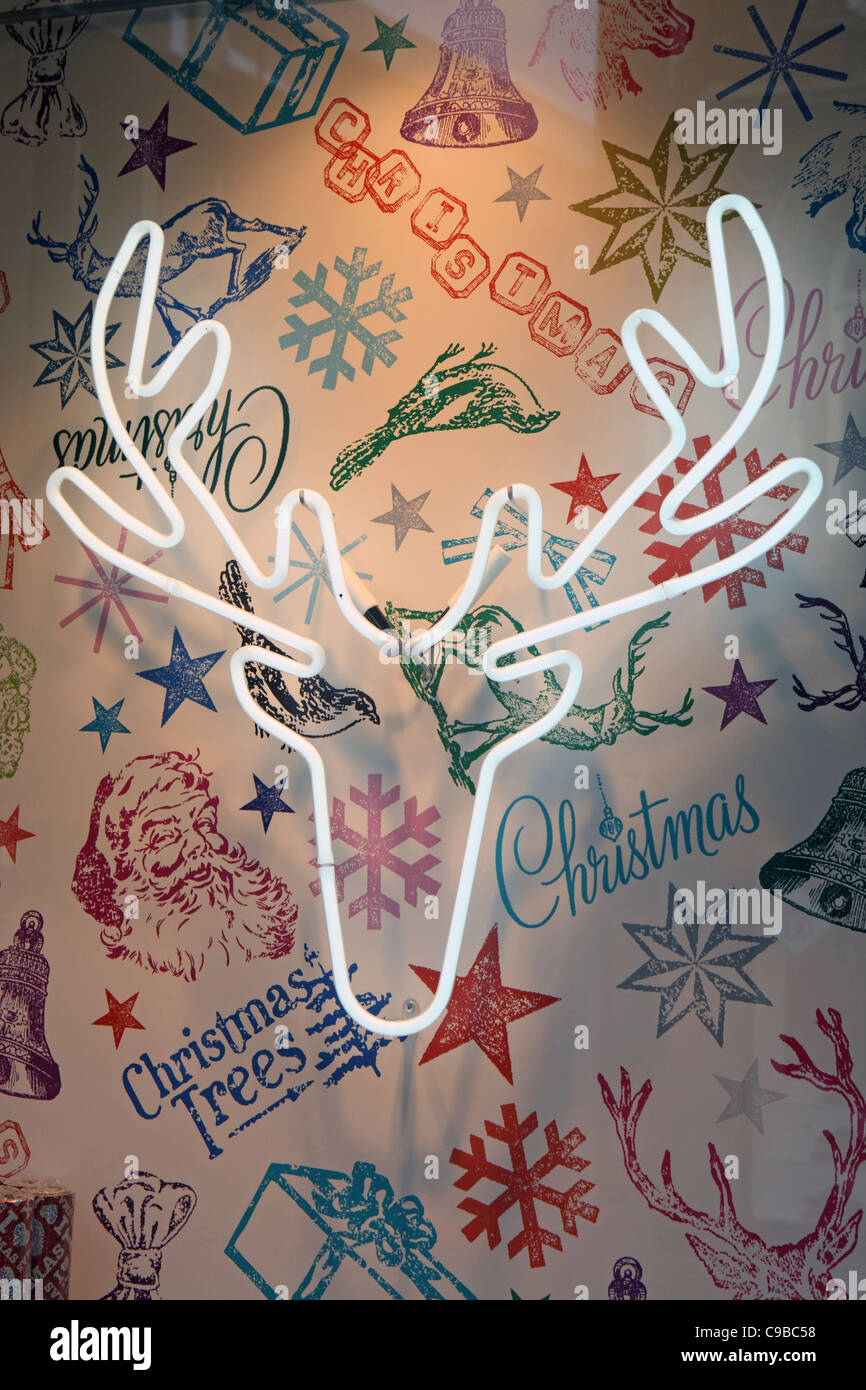 Reindeer shaped light Christmas window display in shop in Norwich ...