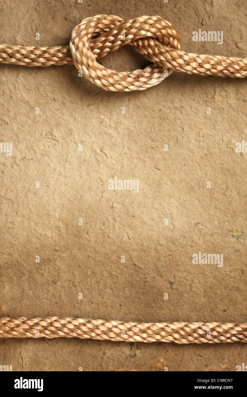 Handmade paper with rope border Stock Photo - Alamy