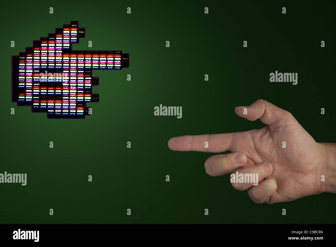 the computer hand pointer threateningly face to face with a real hand ...