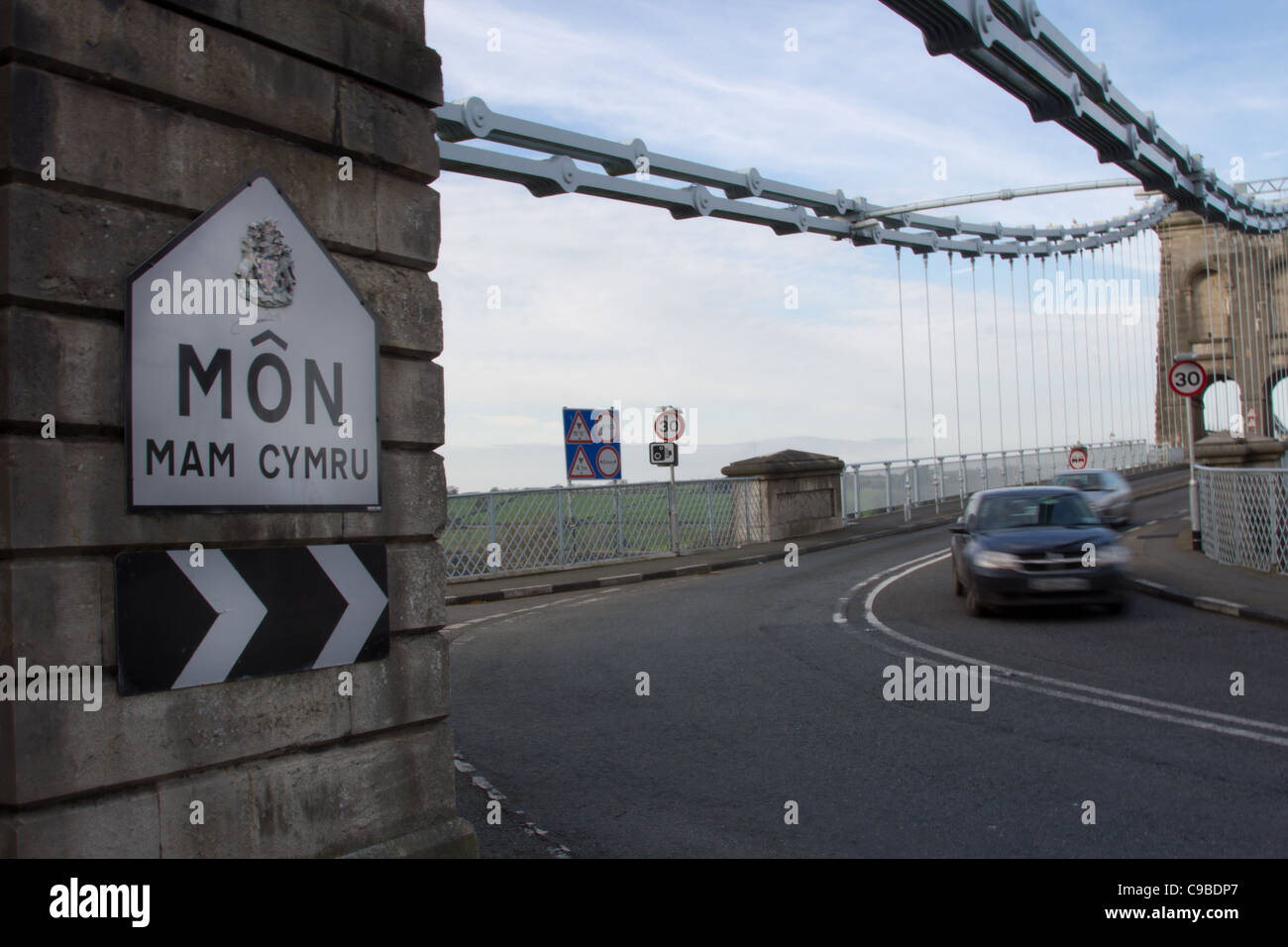 Môn Mam Cymru Anglesey sign on the entrance to the Menai Suspension ...