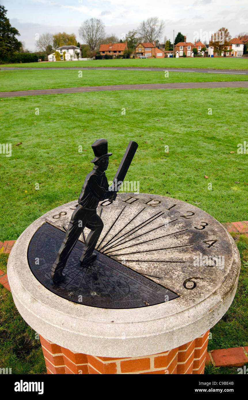 Millennium sundial on the green at Holyport houses in the distance ...