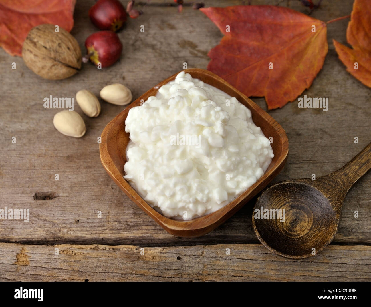 Fresh Cottage Cheese On Wooden Background, Close Up Stock Photo - Alamy