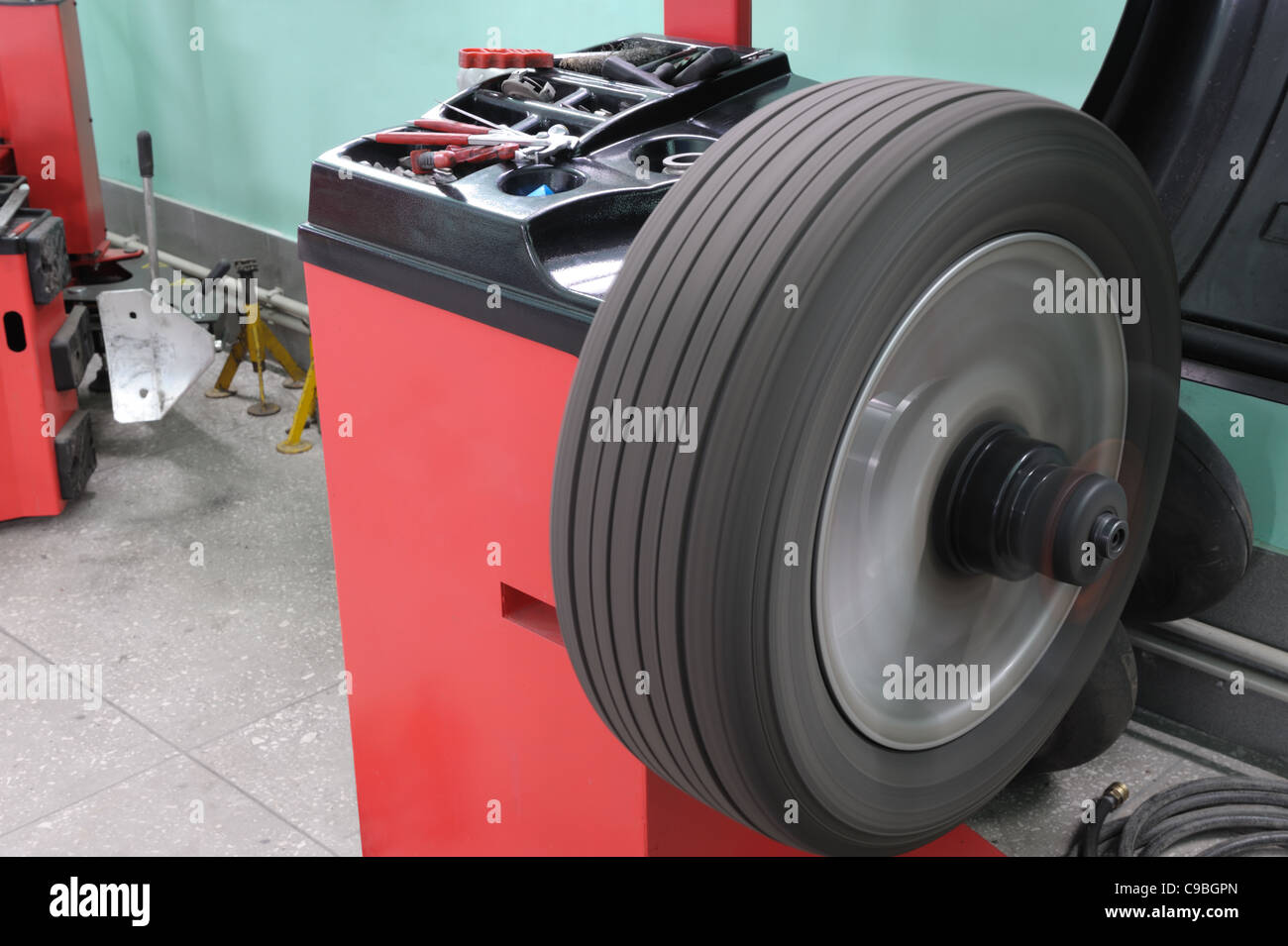 The machine tool for balancing of automobile wheels Stock Photo - Alamy
