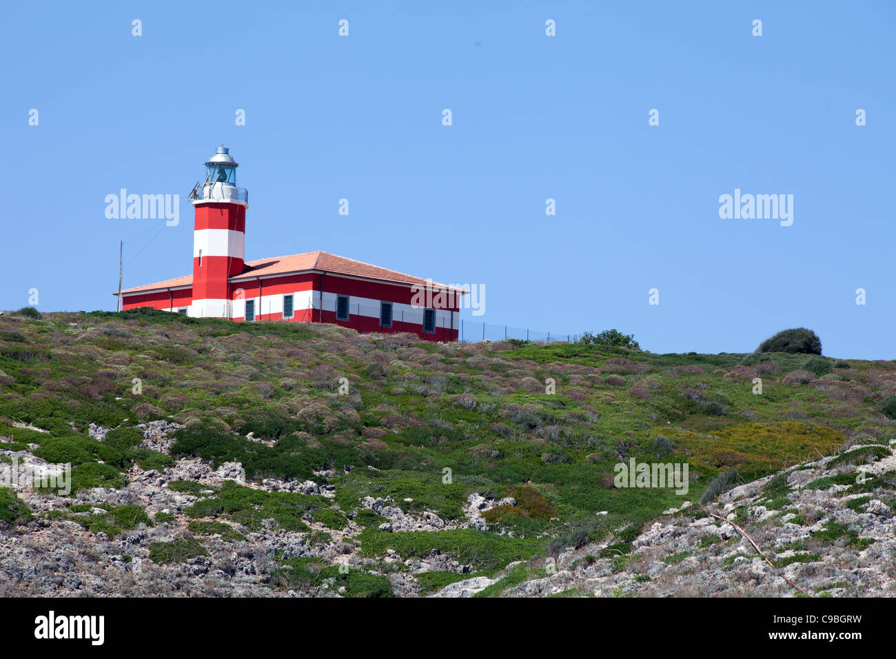 Lighthouse on the coast of Giannutri island, Tuscan Archipelago, Italy ...