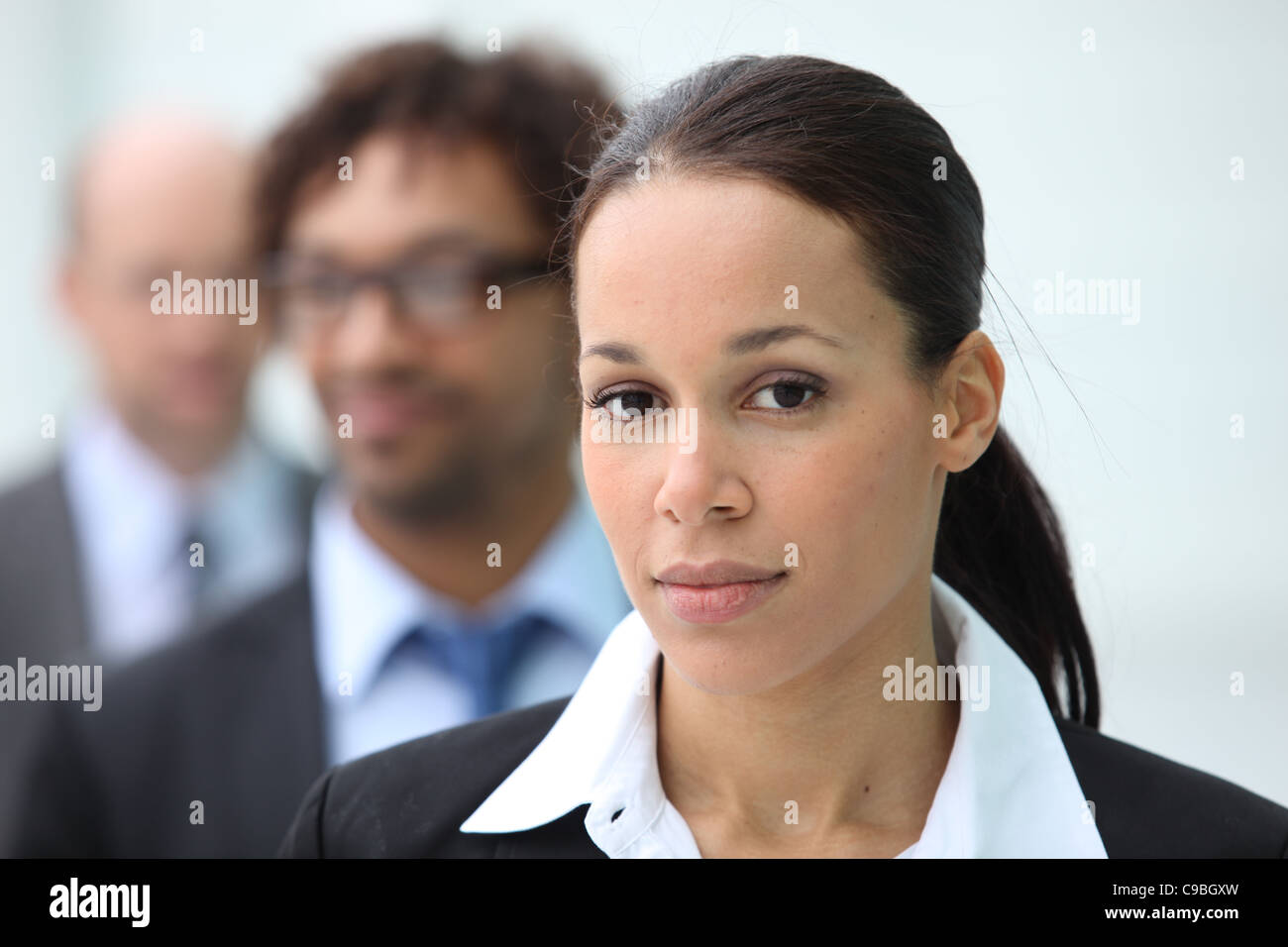 A businesswoman with her colleagues Stock Photo - Alamy A businesswoman with her colleagues Stock Photo - Alamy