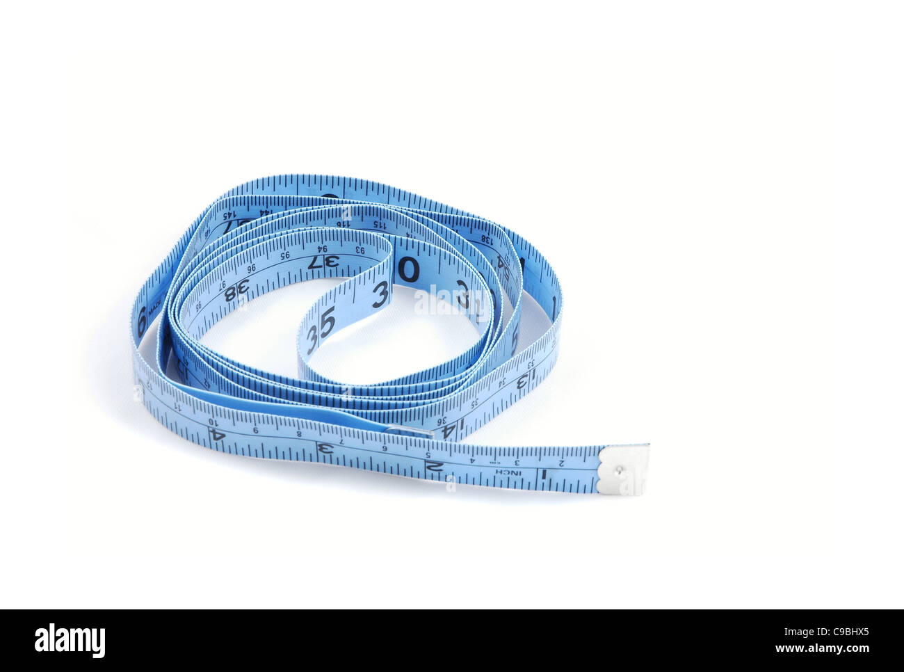 Blue measuring tape on an isolated white background Stock Photo - Alamy
