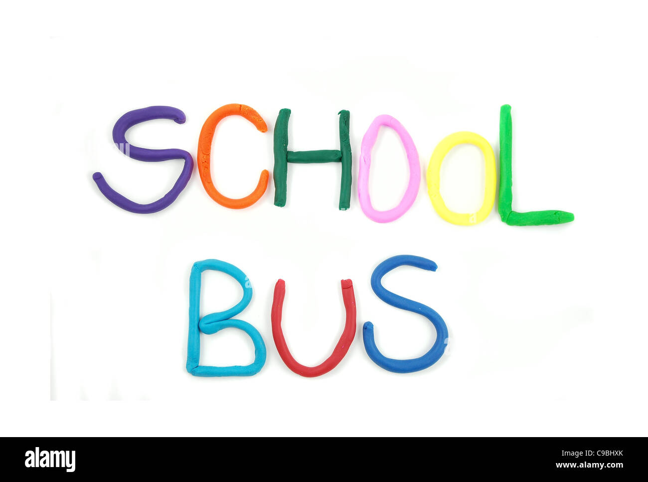 "School Bus" written using child's clay isolated on white background ...