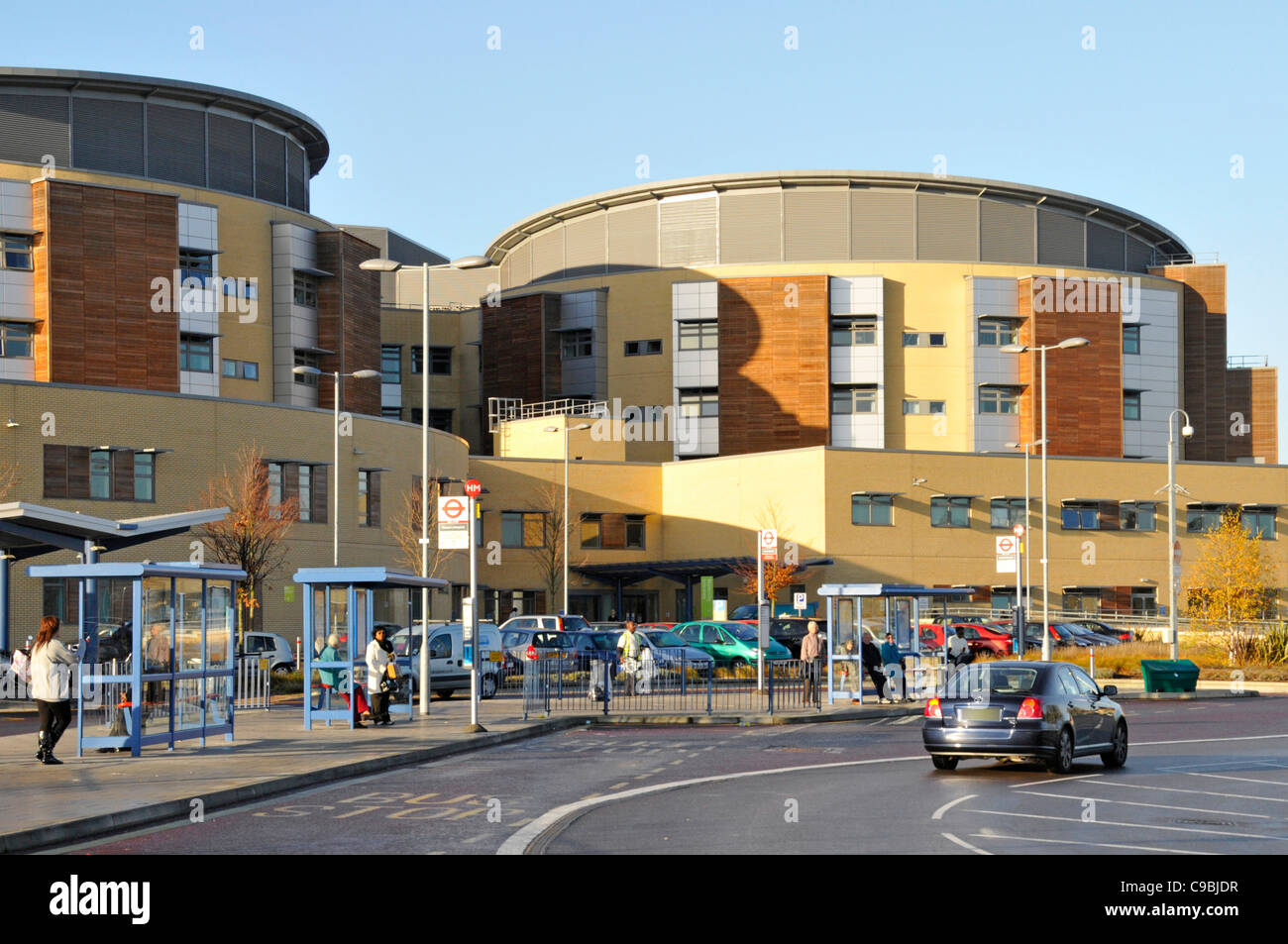 Bus stop & exterior of NHS Queens Hospital building & Maternity ... Bus stop & exterior of NHS Queens Hospital building & Maternity ...