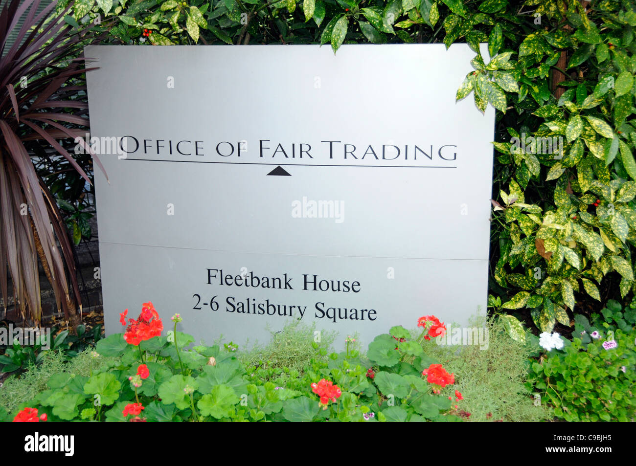 The headquarters building sign at entrance to the Office of Fair ...