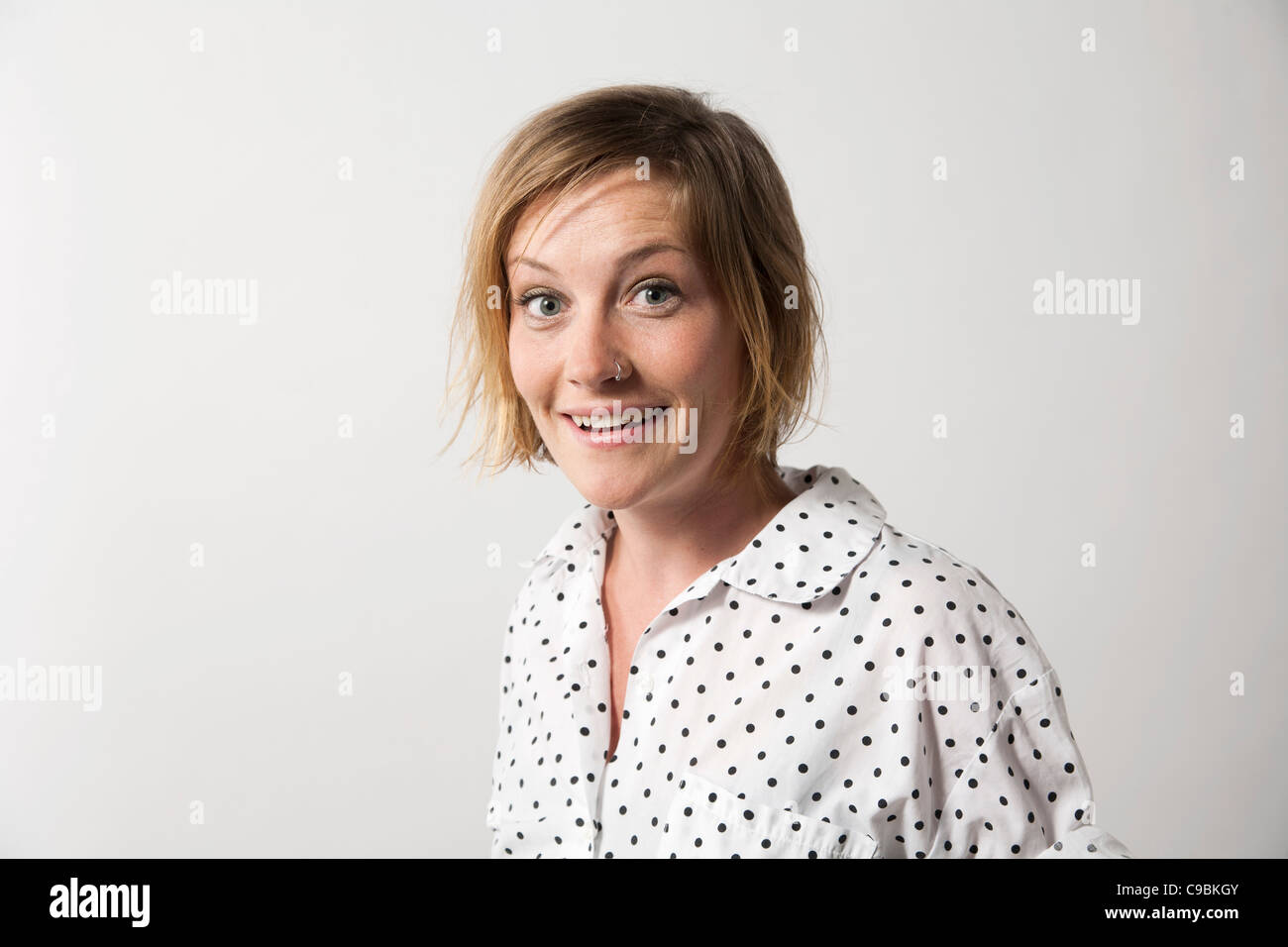 Woman against white background, portrait Stock Photo - Alamy