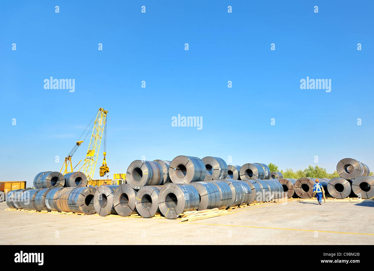 packed rolls of steel sheet Stock Photo - Alamy