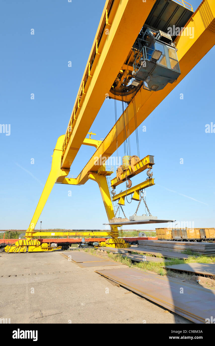 Crane and steel plates hi-res stock photography and images - Alamy