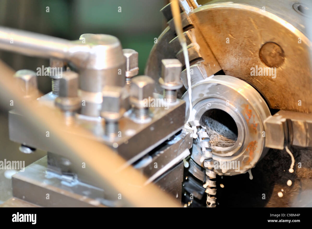 Turning lathe in action Stock Photo - Alamy