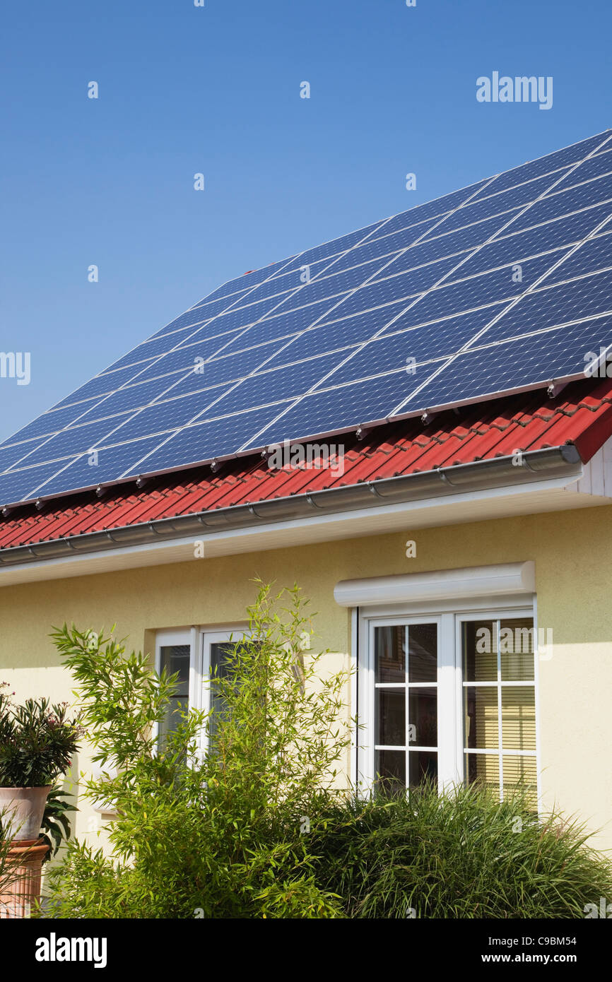 Residential building with solar roof hi-res stock photography and ...