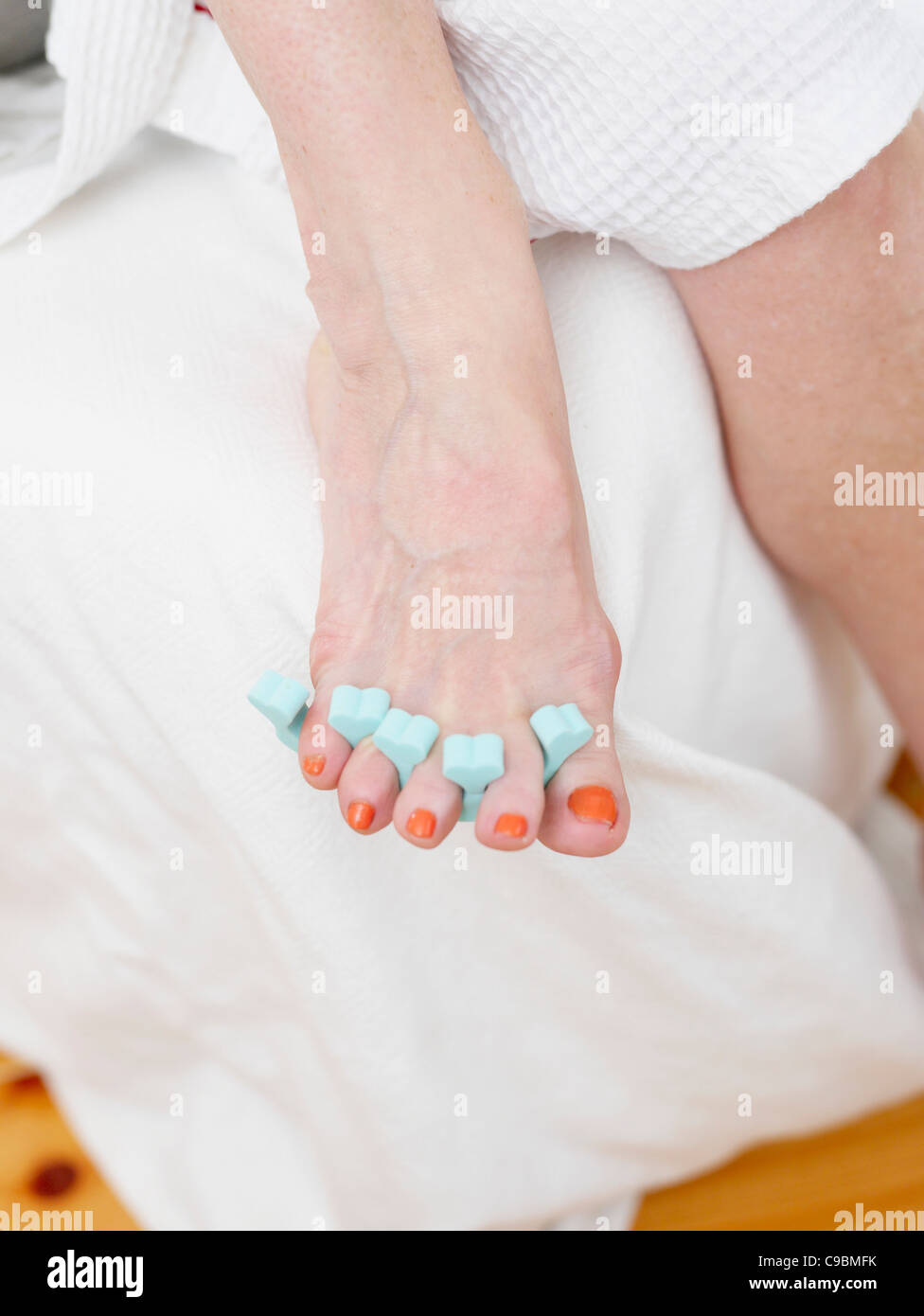 Senior woman painting toenails, close up Stock Photo - Alamy