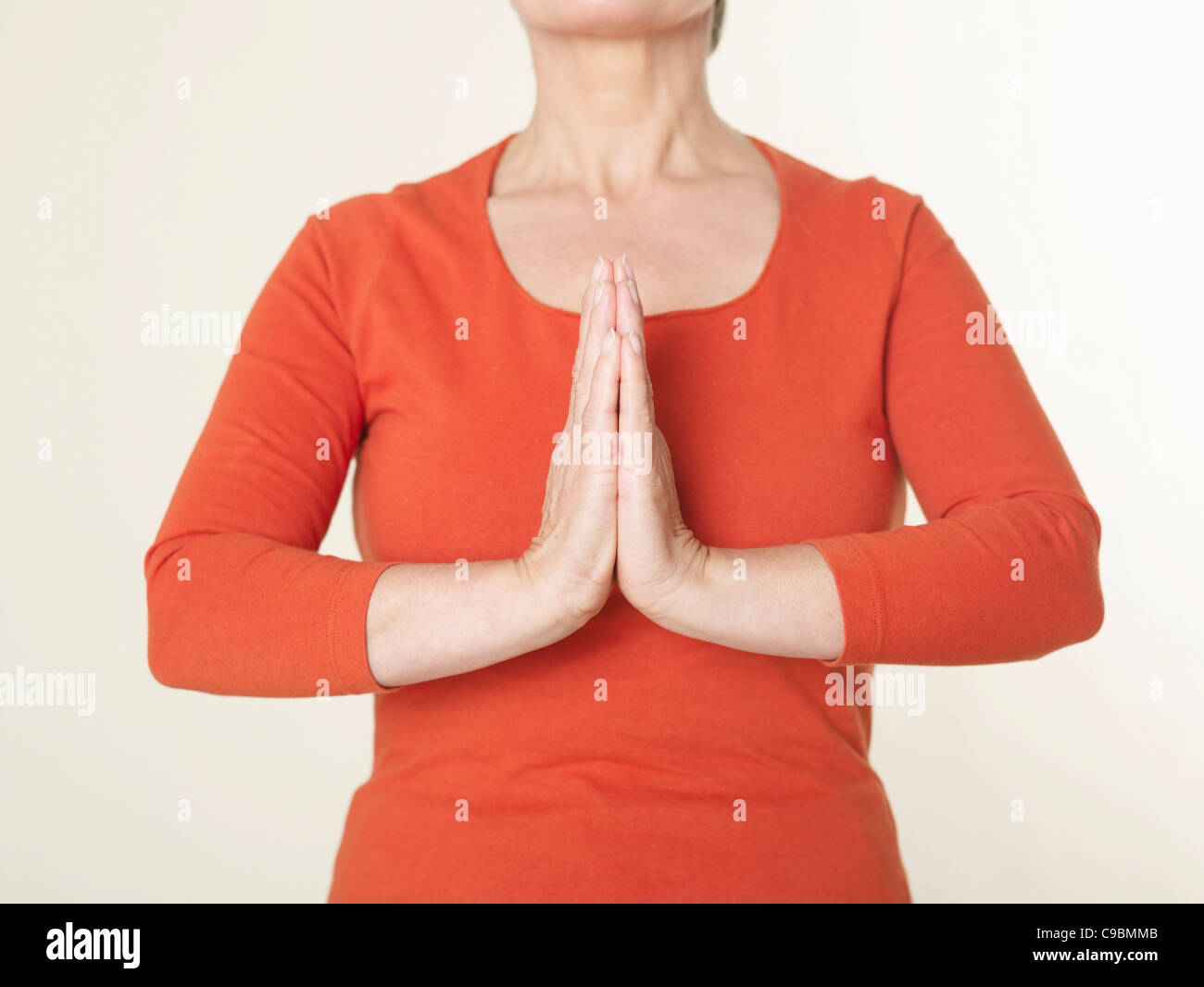 Praying posture hi-res stock photography and images - Alamy