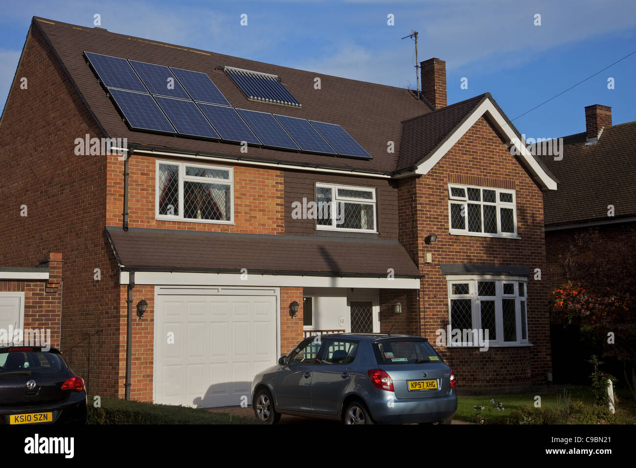 Solar panels on a house roof in England Stock Photo - Alamy
