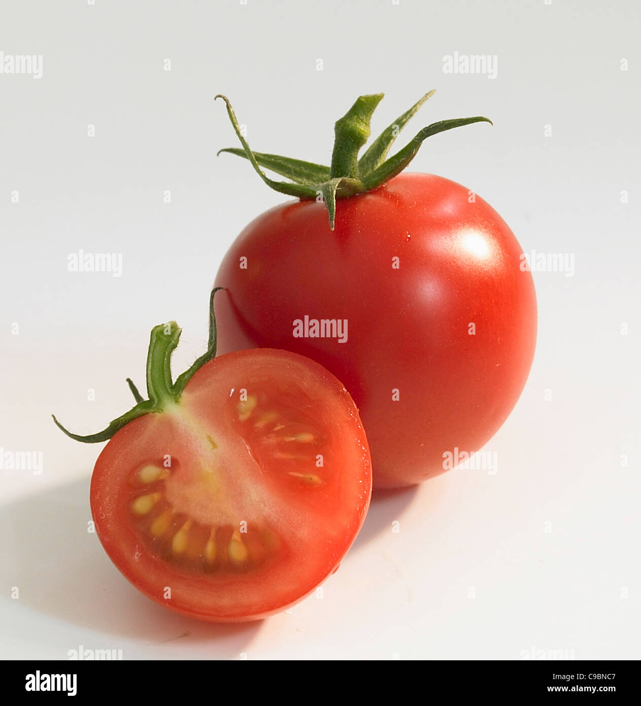 Tomato slice sliced half tomatoes hi-res stock photography and images ...