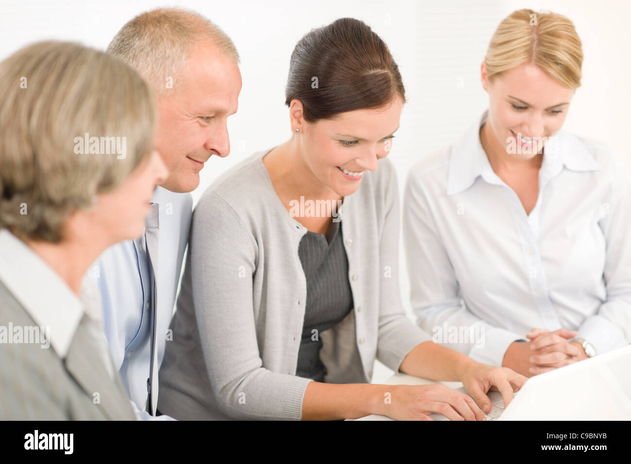 Business team attractive businesswomen with happy colleagues working ...
