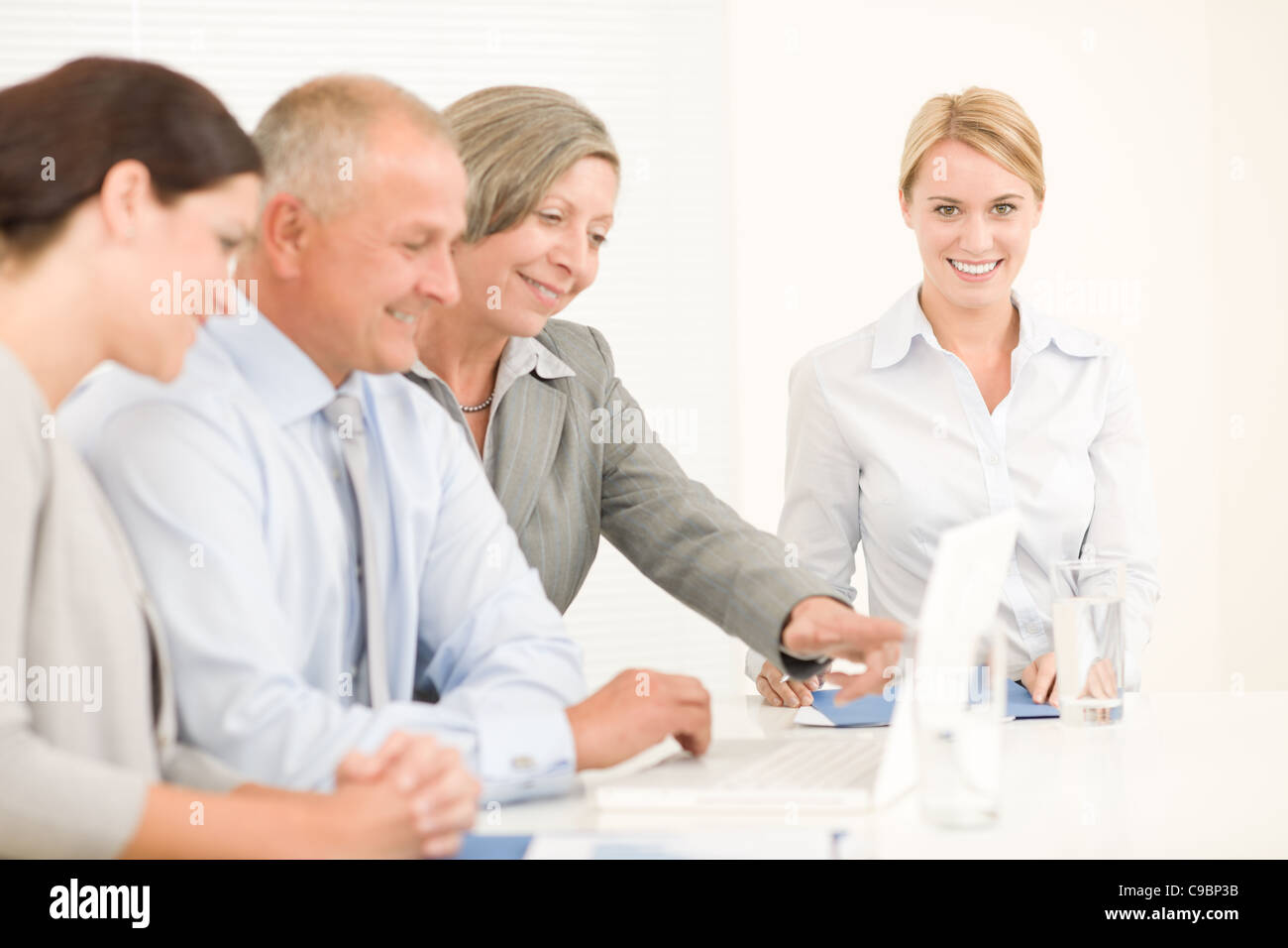 Business team attractive businesswomen with happy colleagues working ...