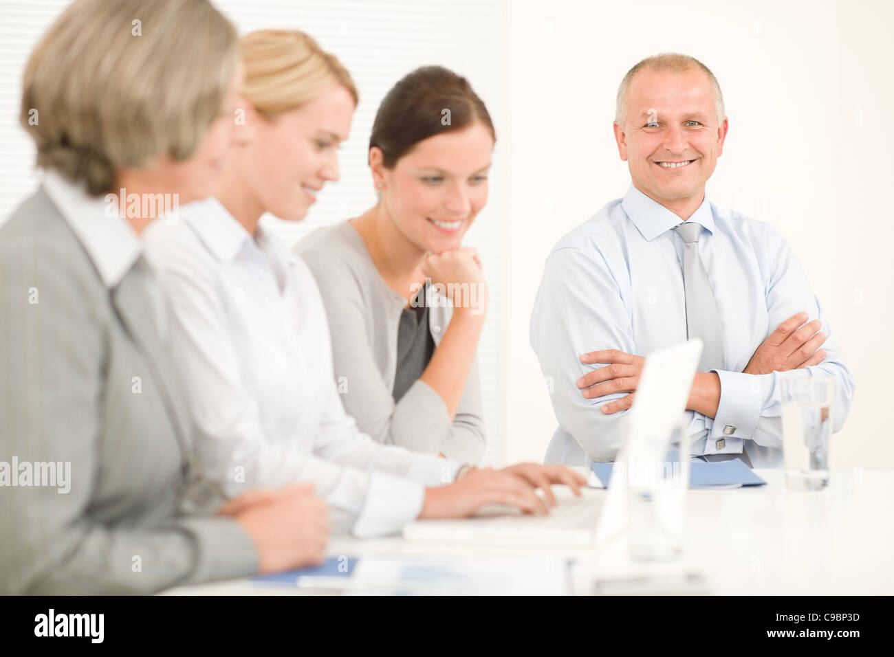Business team attractive businesswomen with happy colleagues working ...