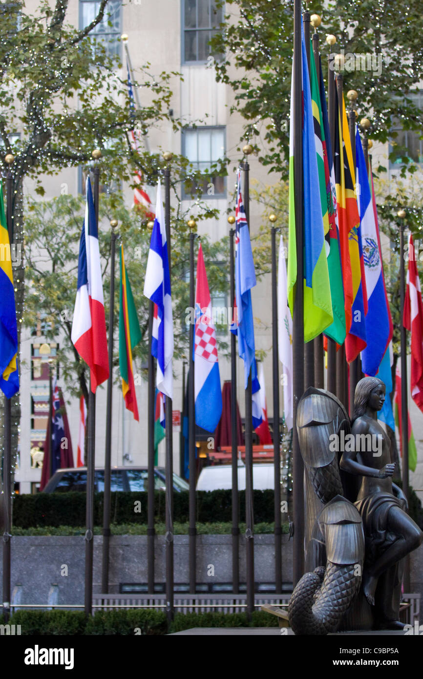 The famous flags flying at the Rockefeller Center On Fifth Avenue and ...