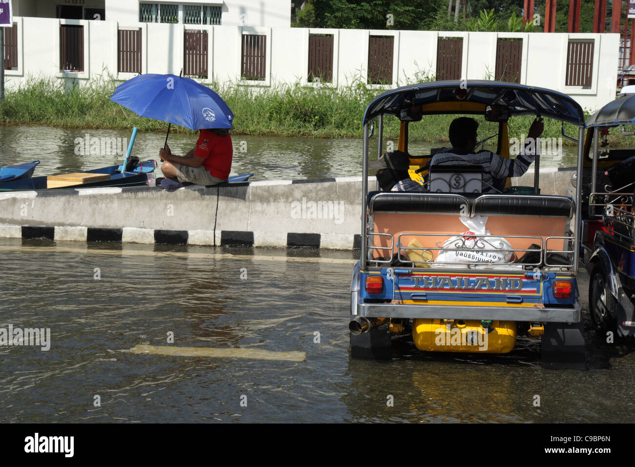 Floodwaters on street at Pakkred District , Nonthaburi province ...