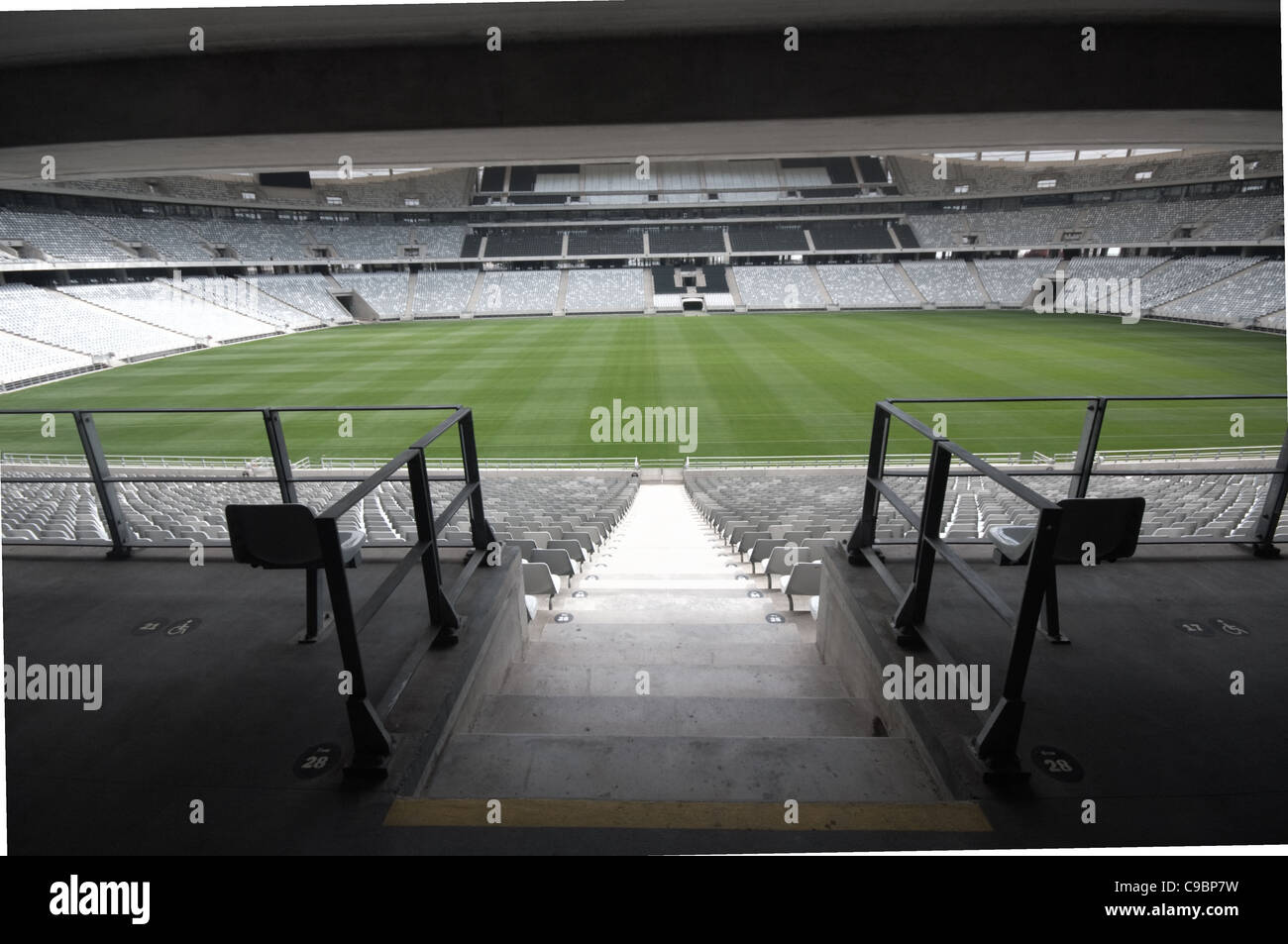 Empty football stadium with a sign not to walk on the green Stock Photo ...