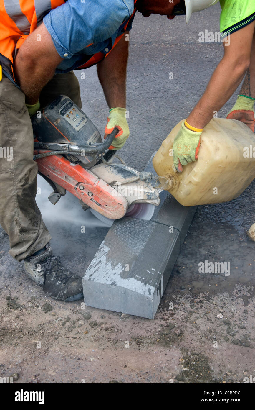 Cutting curb stone hi-res stock photography and images - Alamy
