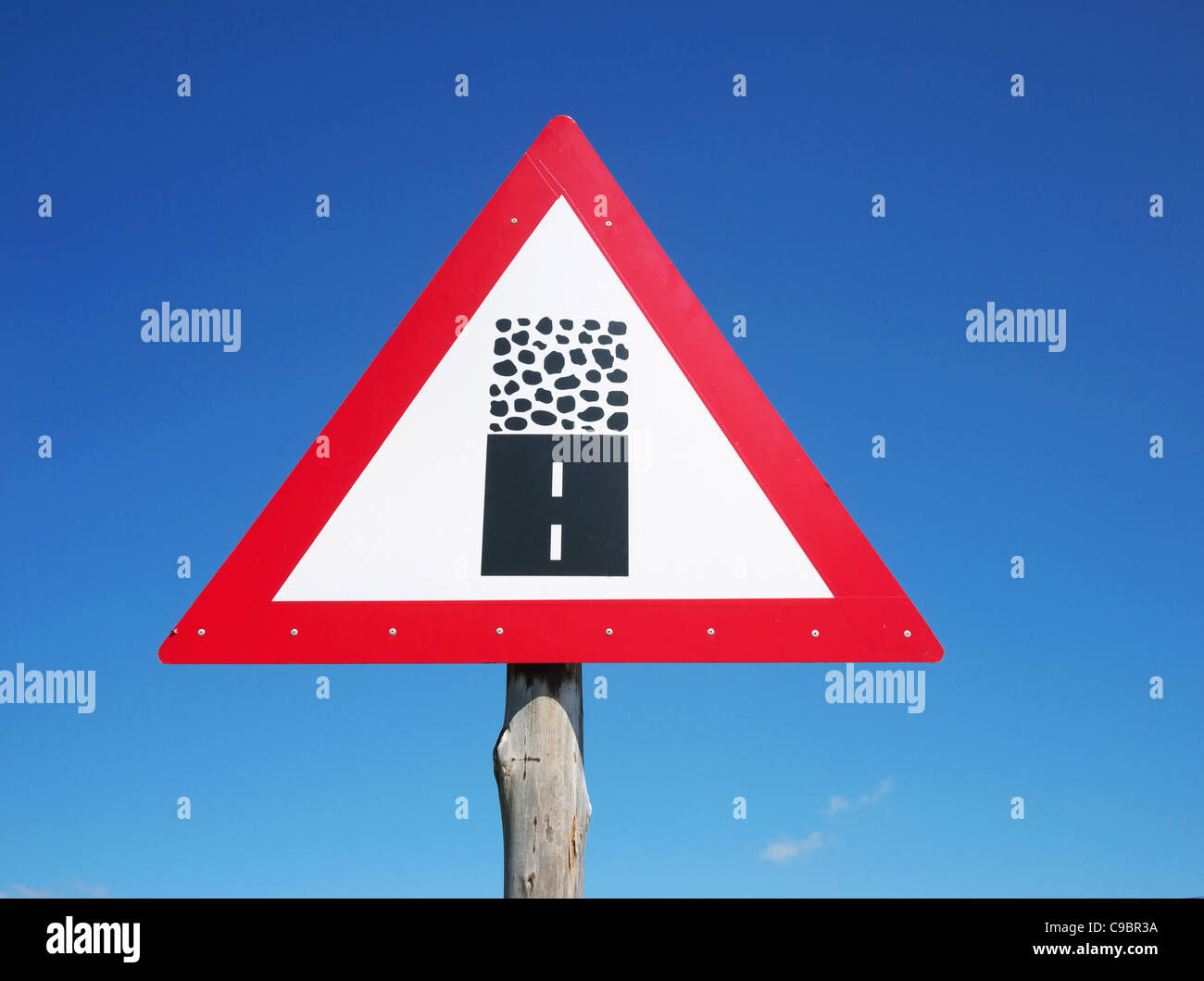Road sign indicting tar road turning into dirt road, Salem, Eastern ...