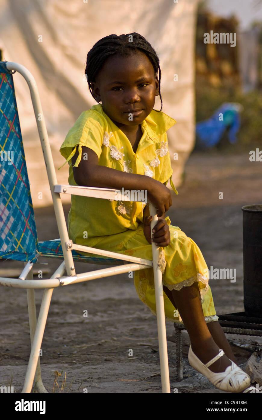 A little girl in her Sunday frock at a Seventh Day Adventist gathering ...
