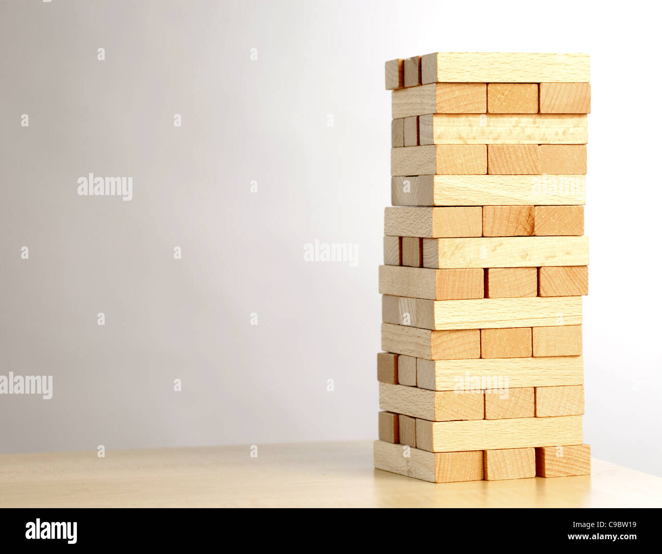 Really nice toy: a tower made by block of wood Stock Photo - Alamy