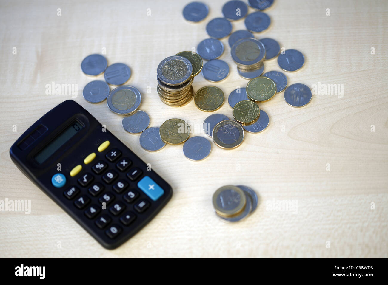 Black computer coins calculating money hi-res stock photography and ...