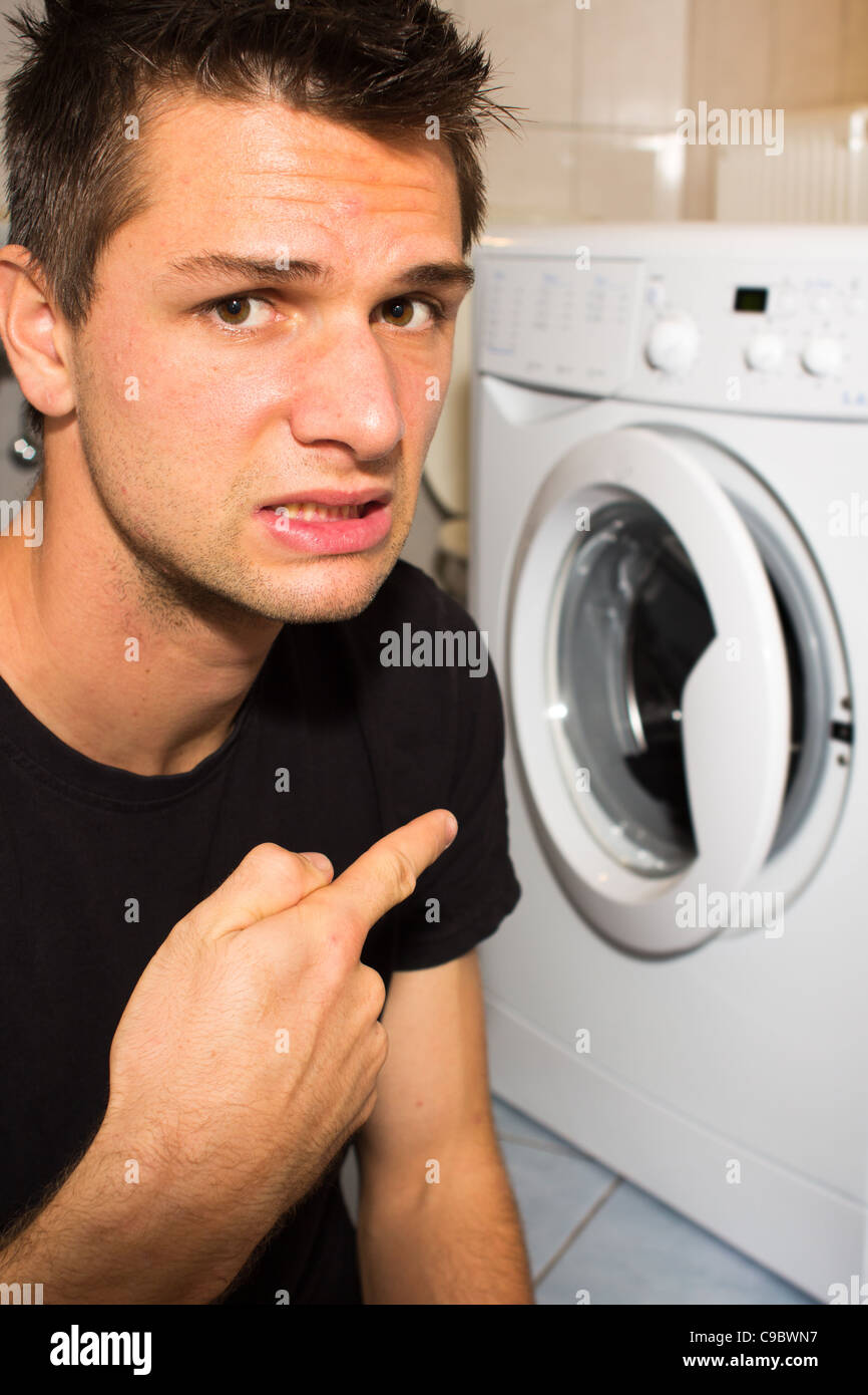 Portrait in washing machine man hi-res stock photography and images - Alamy