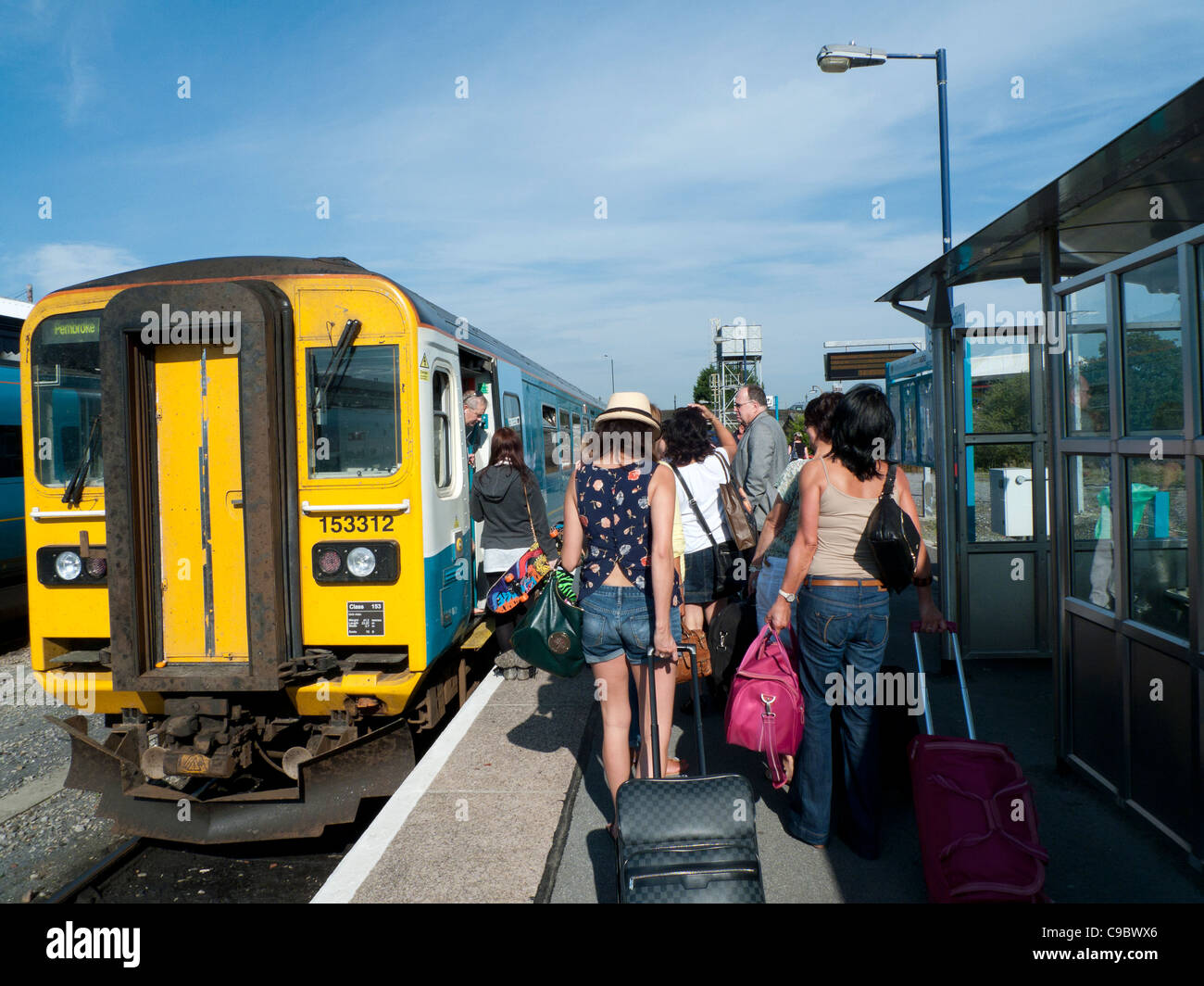 Woman Boarding Train Stock Photos & Woman Boarding Train Stock Images ...