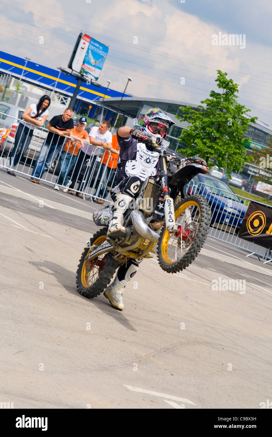 Stunt style - motorcycles trick Stock Photo - Alamy